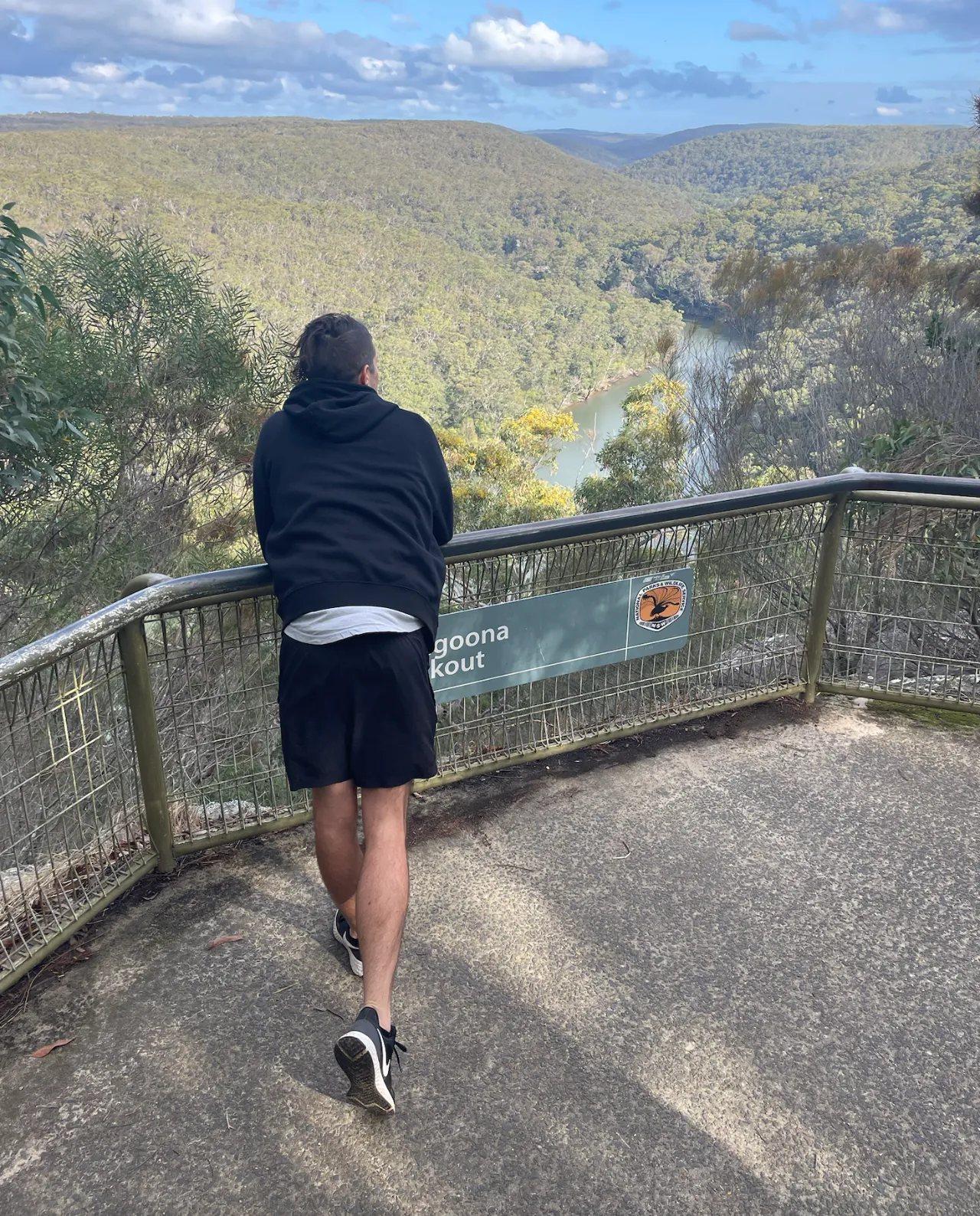 bungoona-lookout-spot-man-bending-over-rail - Hunting Waterfalls