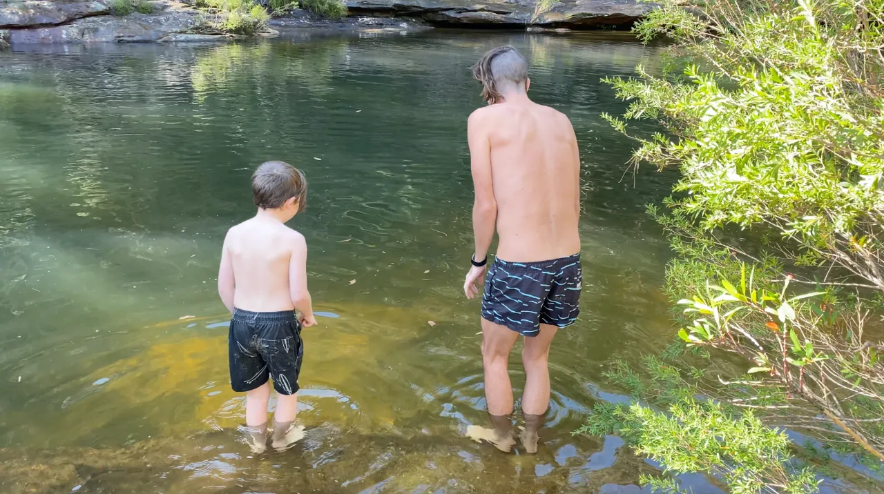karloo-pools-ledge-swimming-entry-near-river-boy-man - Hunting Waterfalls